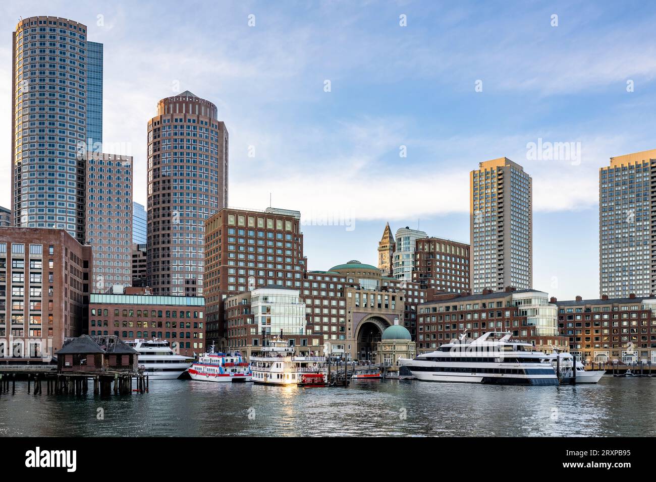 Ferries and other passenger ships are standing at the pier on the ...