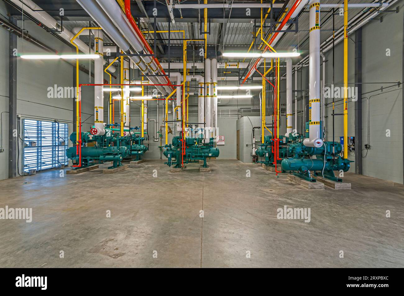 Compressor room in ammonia-cycle industrial refrigeration cold-storage ...
