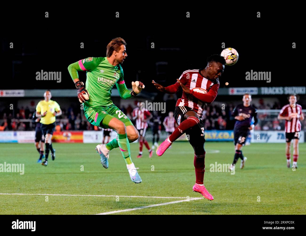 Luton Town goalkeeper Tim Krul (left) and Exeter City's Vincent Harper ...