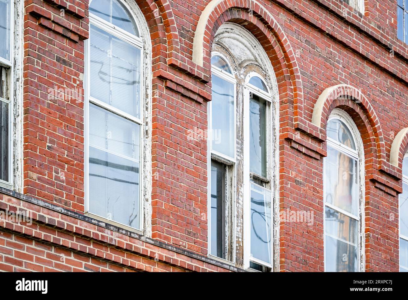 An classic old colonial multistory red brick apartment geometric shape ...