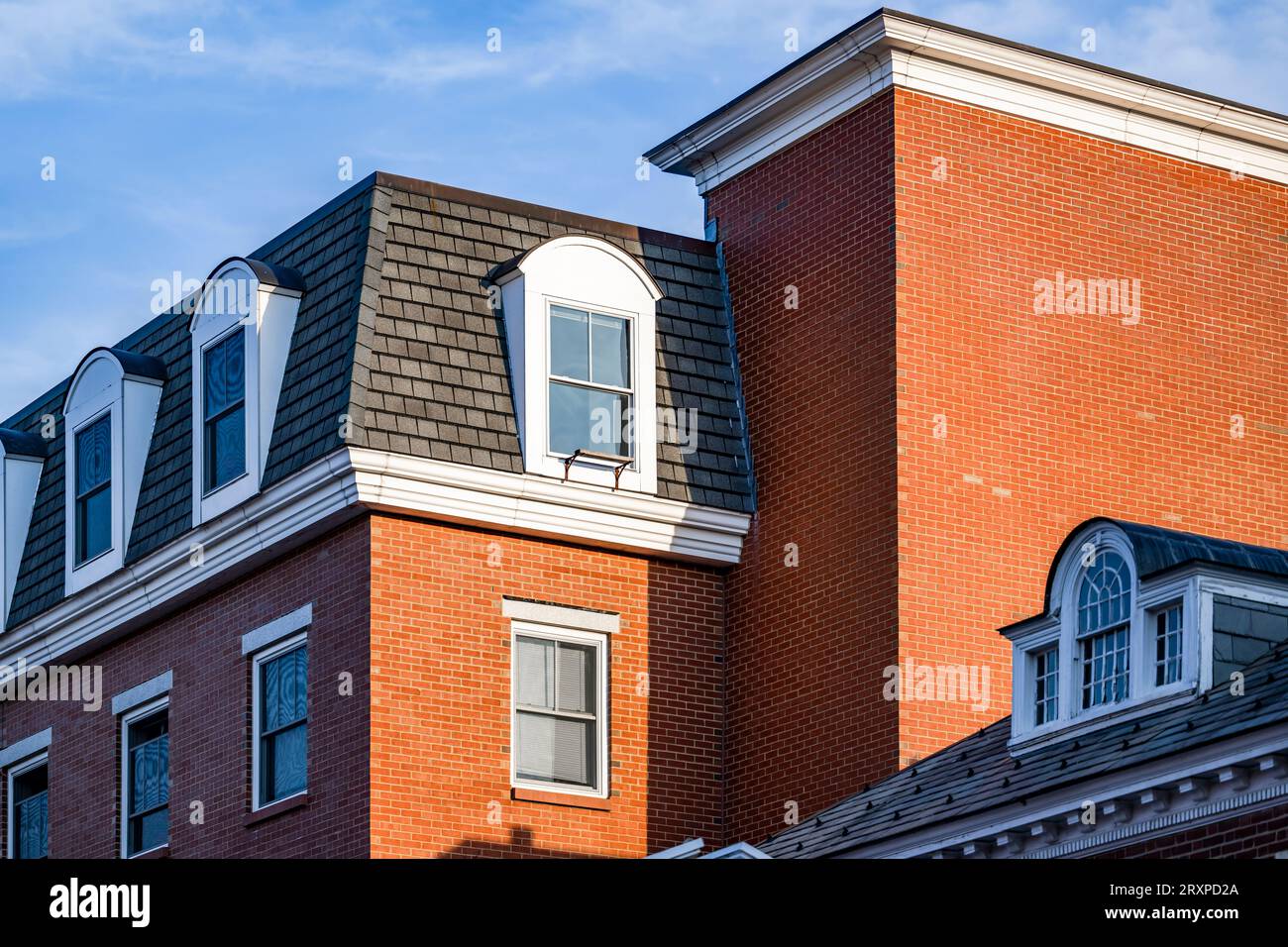 An classic old colonial multistory red brick apartment strict geometric ...