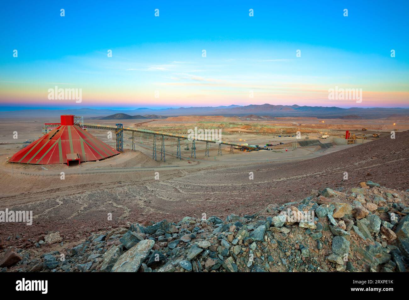 Conveyor belt and stockpile under a dome at an open-pit copper mine in ...