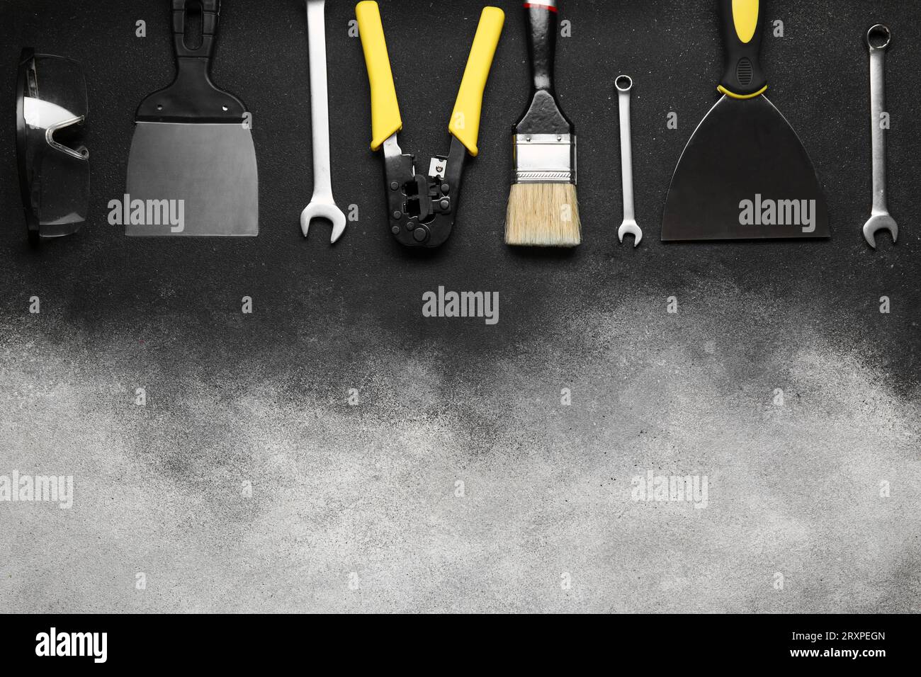 Set of construction tools on grey background Stock Photo - Alamy