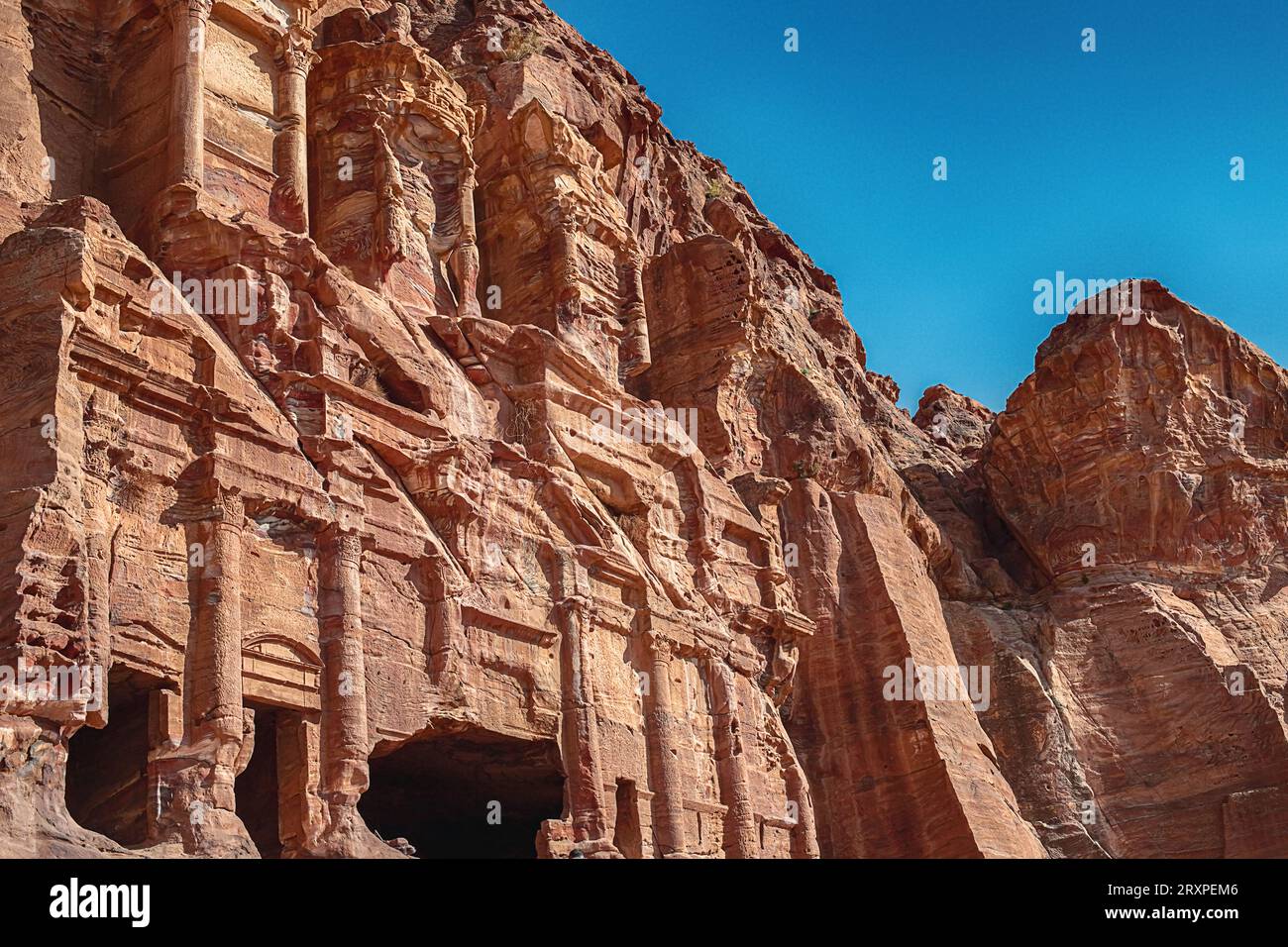 View of the temple and building carved into the sandstone rock. Petra ...