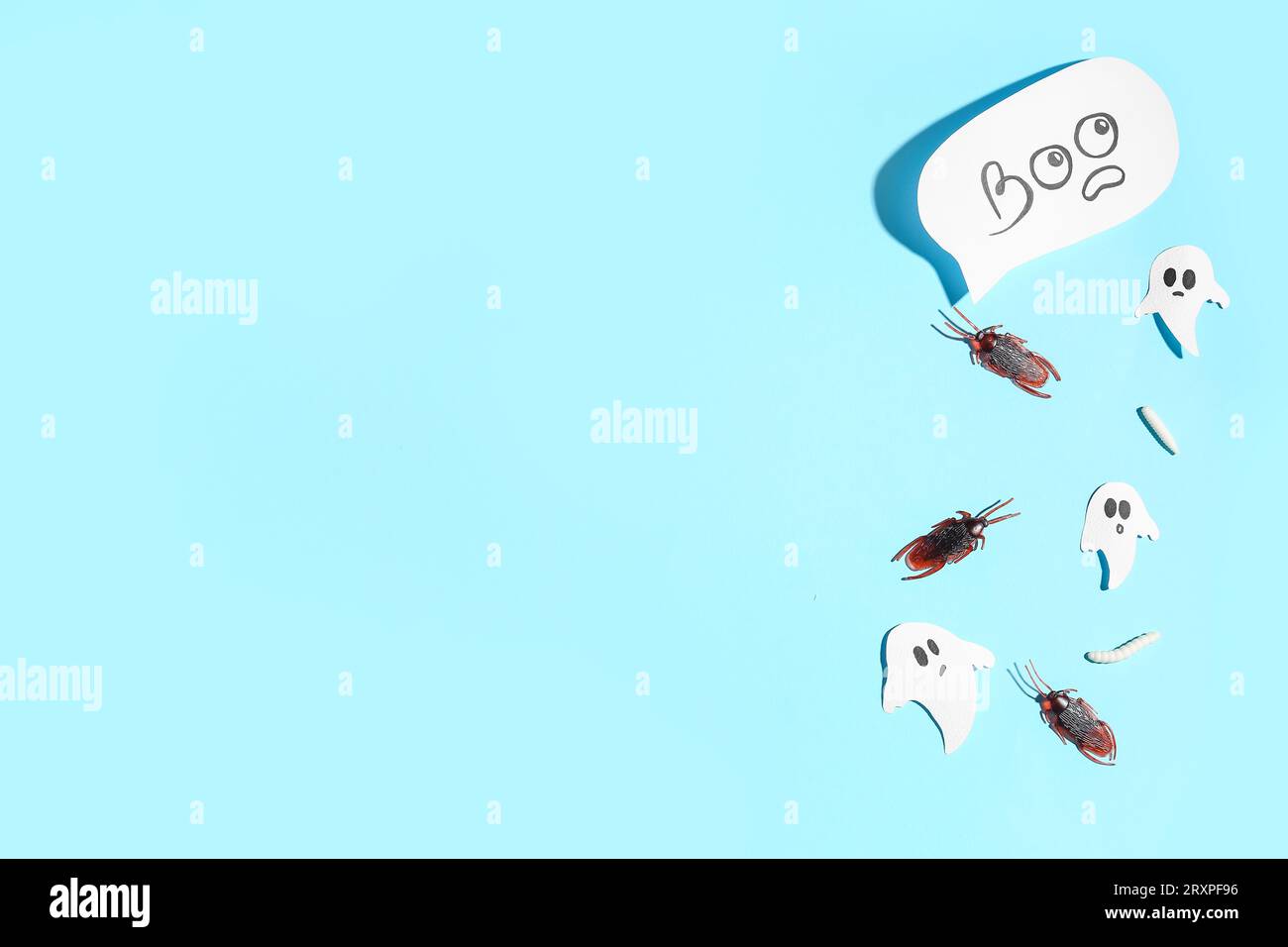 Halloween candy bugs, ghosts and speech cloud with text BOO on blue ...