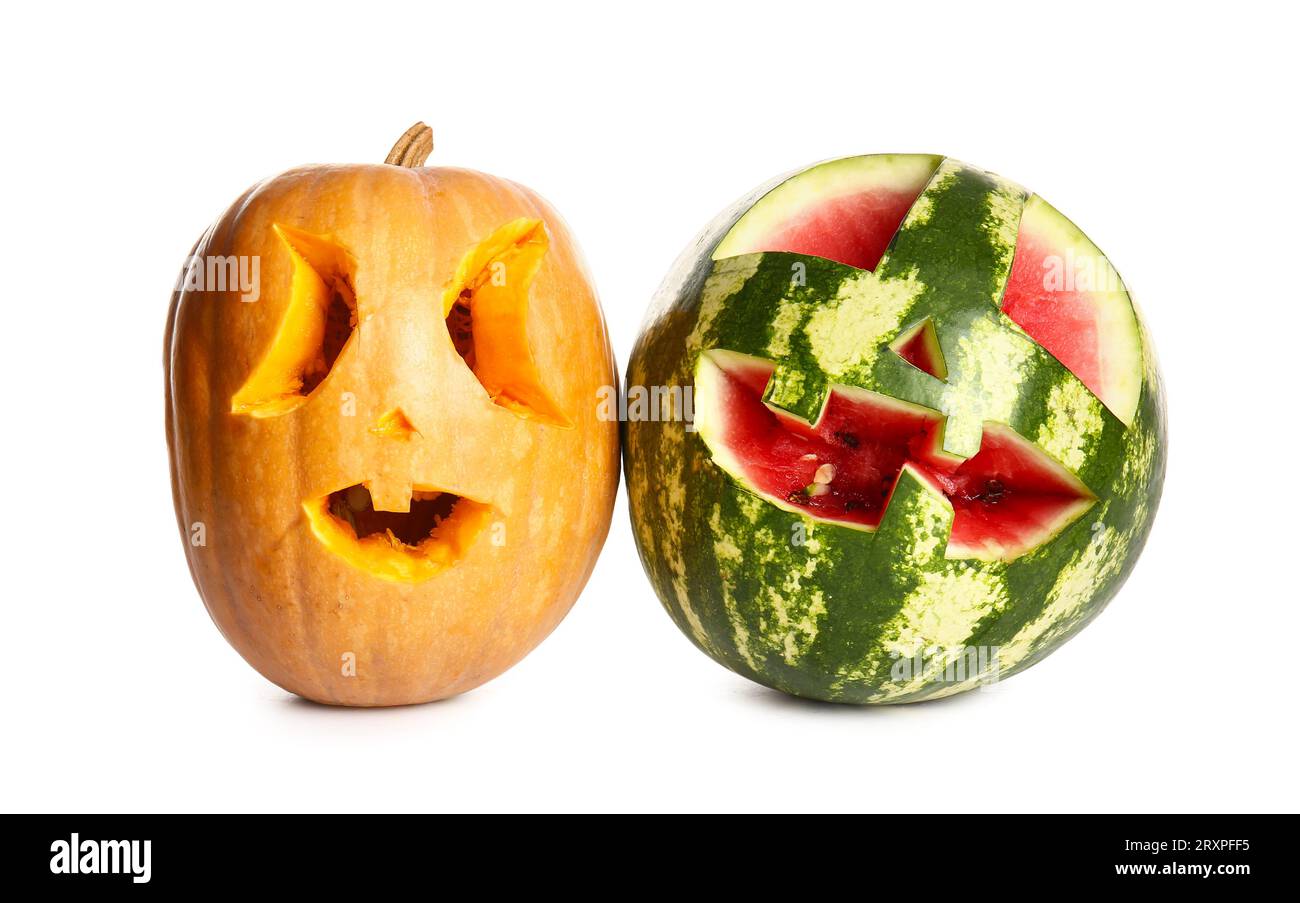 Carved watermelon and pumpkin for Halloween on white background Stock ...