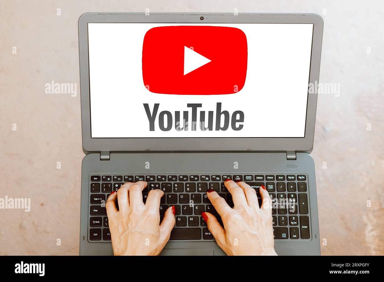 In this photo illustration, the YouTube logo is displayed on a laptop ...