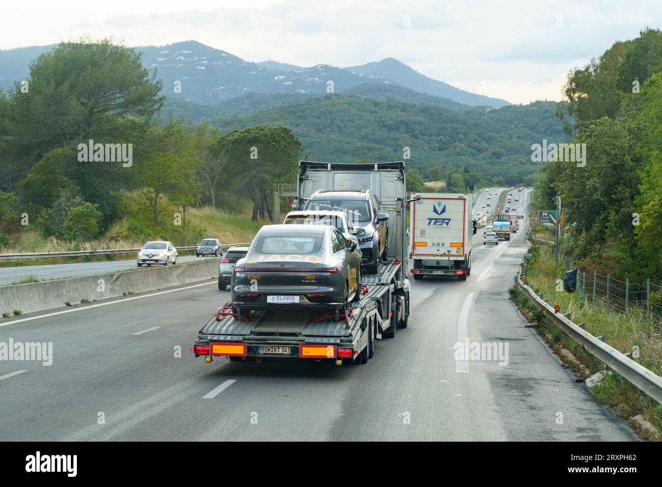Coudoux, France - May 12, 2023: A car transporter transports new cars ...