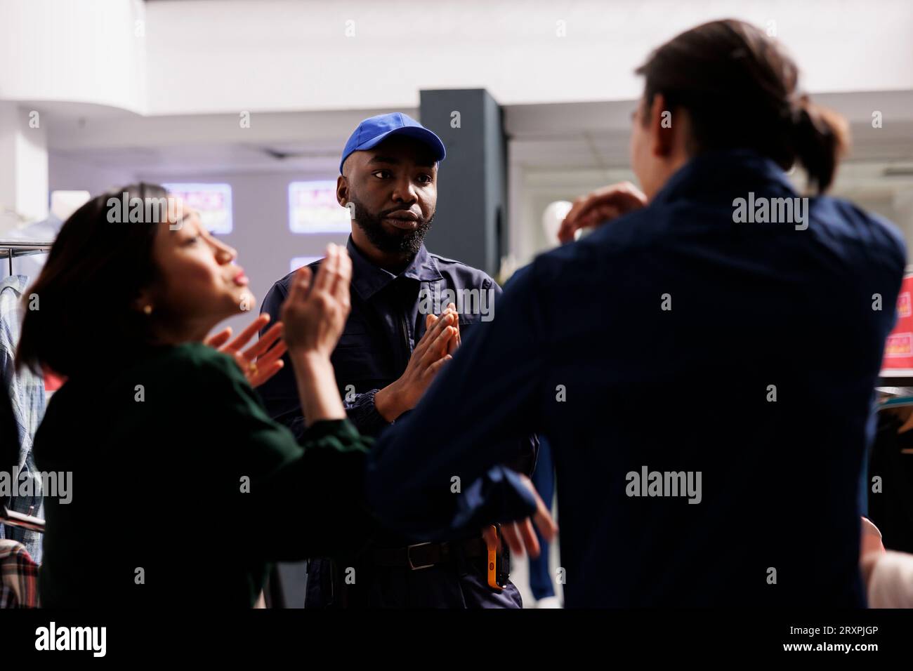Two people fighting in crowd hi-res stock photography and images - Alamy