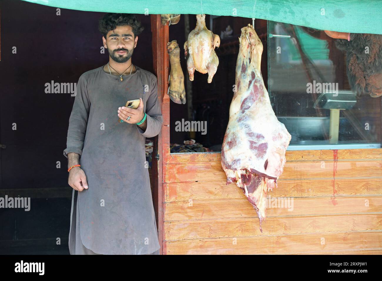 Village butcher in northern Pakistan Stock Photo - Alamy