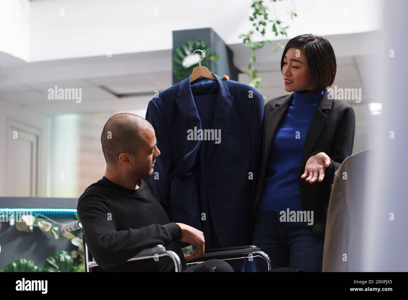 Shopping wheelchair assisting hi-res stock photography and images - Alamy