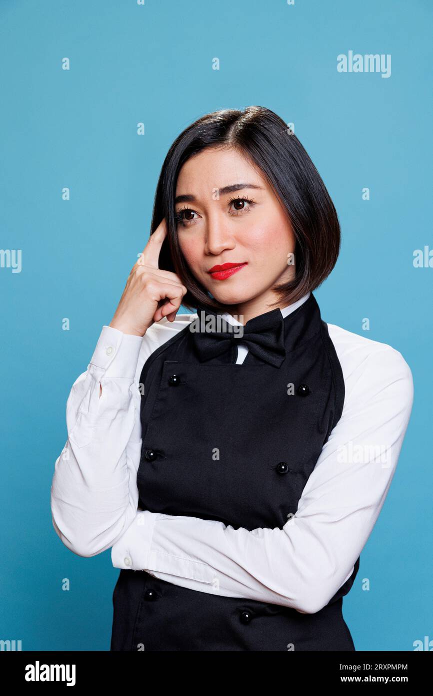 Waitress in blue uniform hi-res stock photography and images - Alamy
