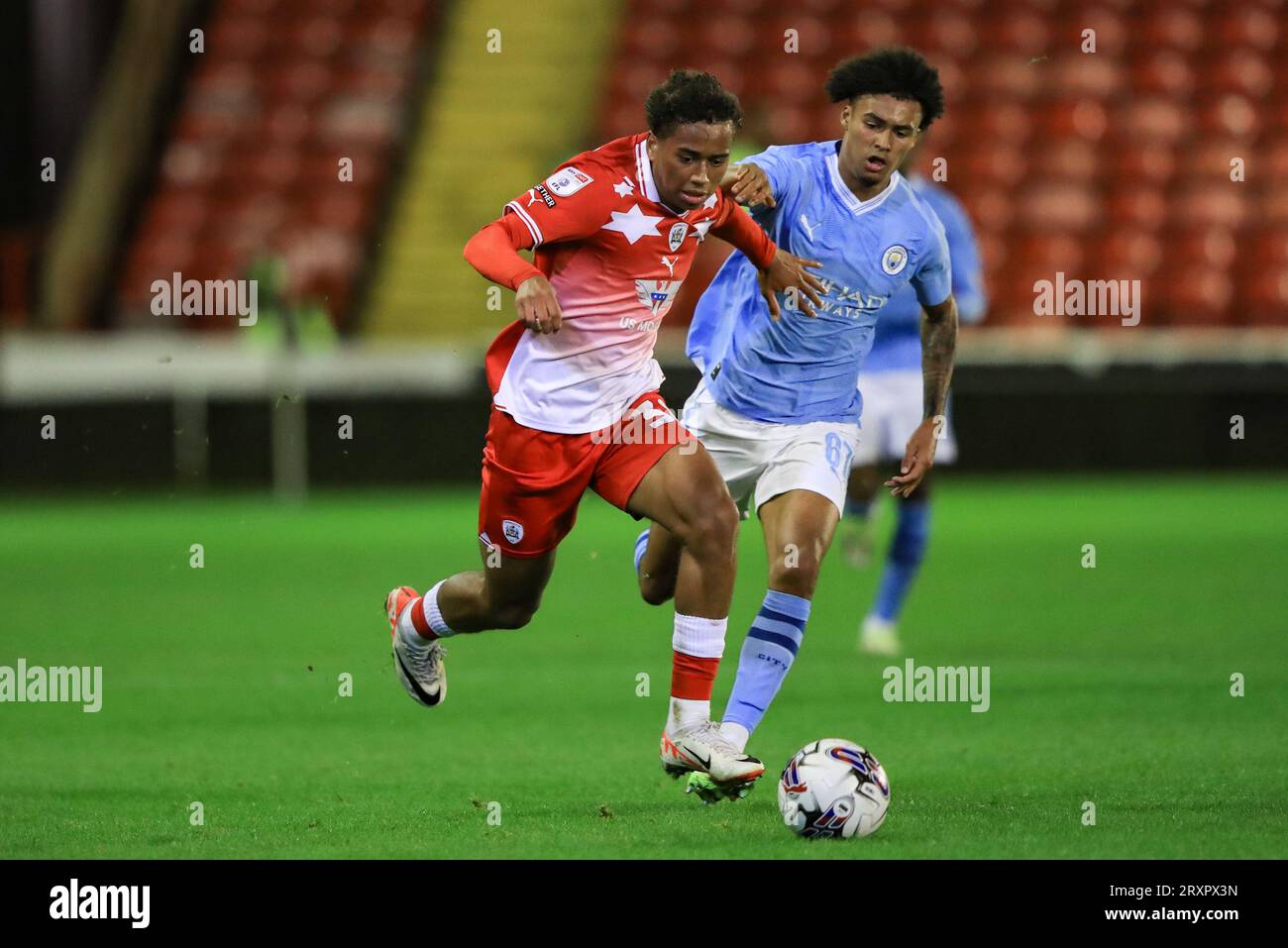 Barnsley, UK. 26th Sep, 2023. Theo Chapman #38 of Barnsley breaks with ...