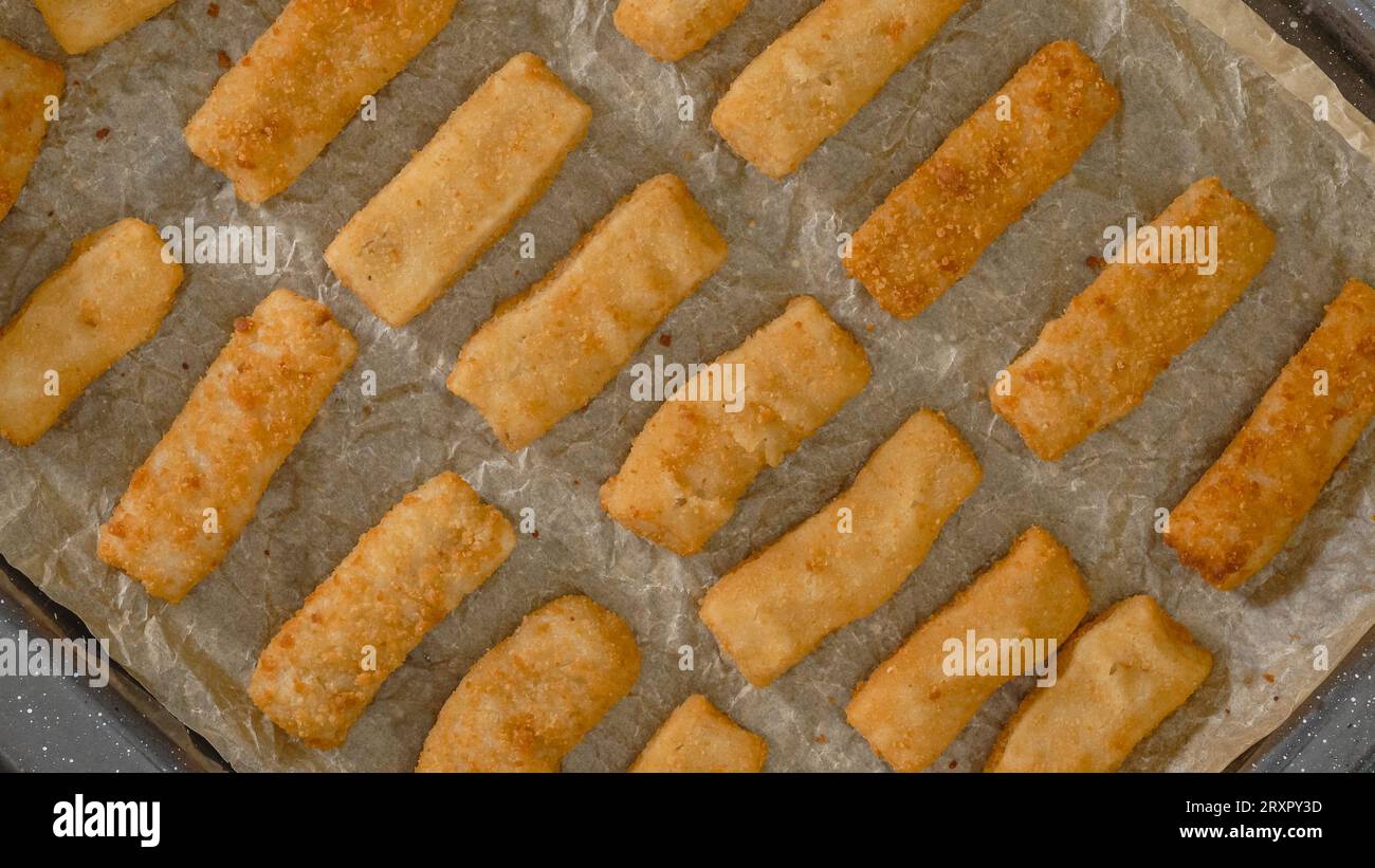 Crunchy breaded fish sticks made from wild caught Alaskan Pollock close ...