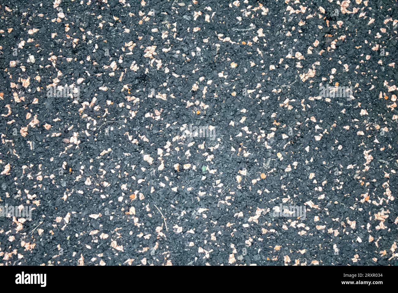 Texture of a rubber crumb for stadium. Rubber asphalt. Resilient ...