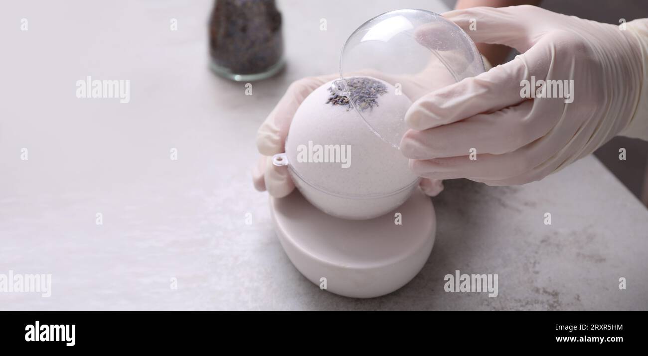 Woman making bath bomb at table, closeup. Banner design Stock Photo - Alamy