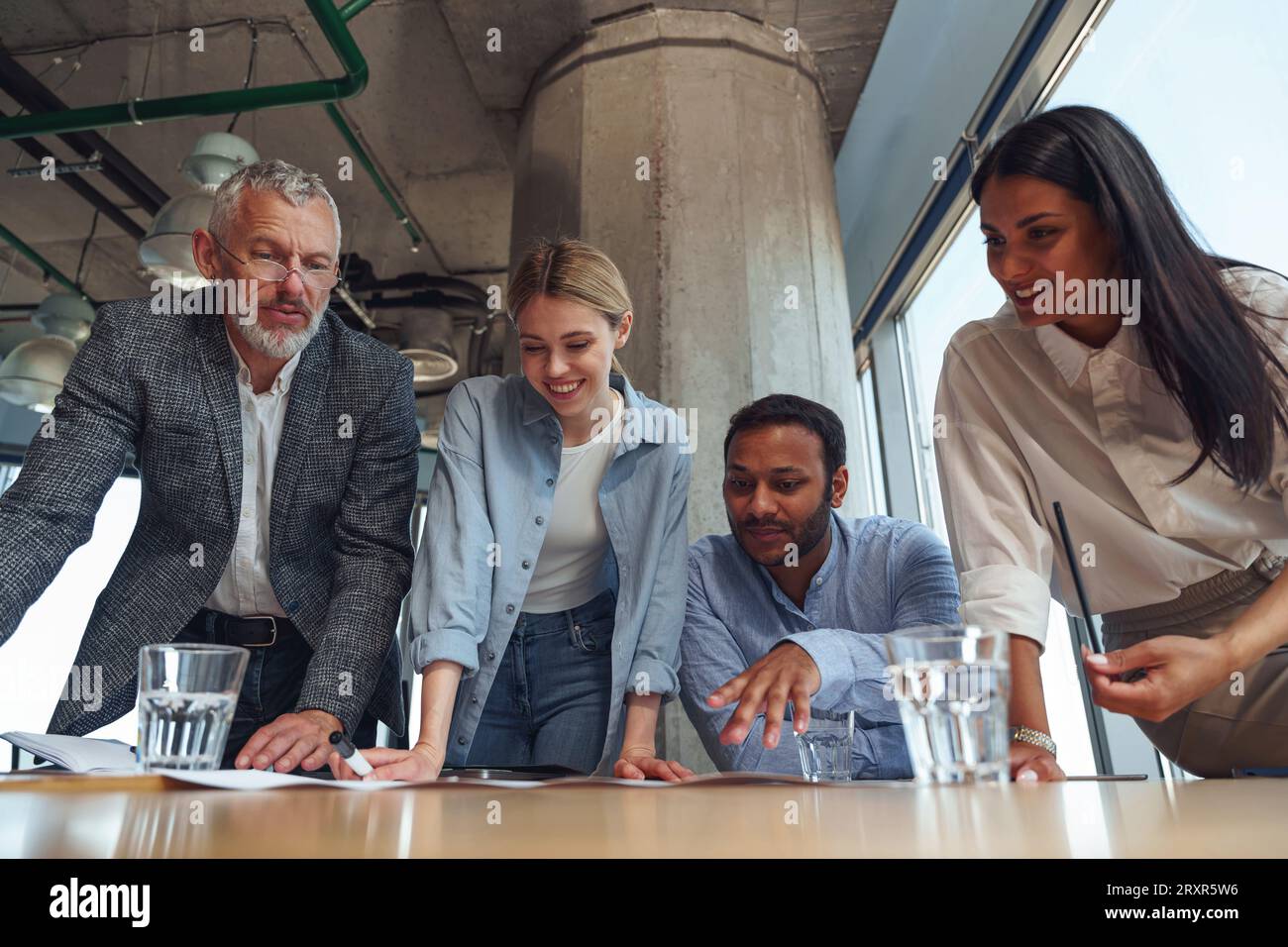 Group of people discussing documents project in the office. Business ...