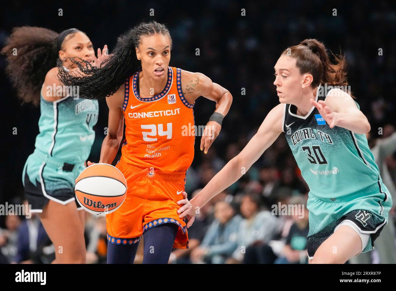 Connecticut Sun forward DeWanna Bonner (24) drives against New York ...