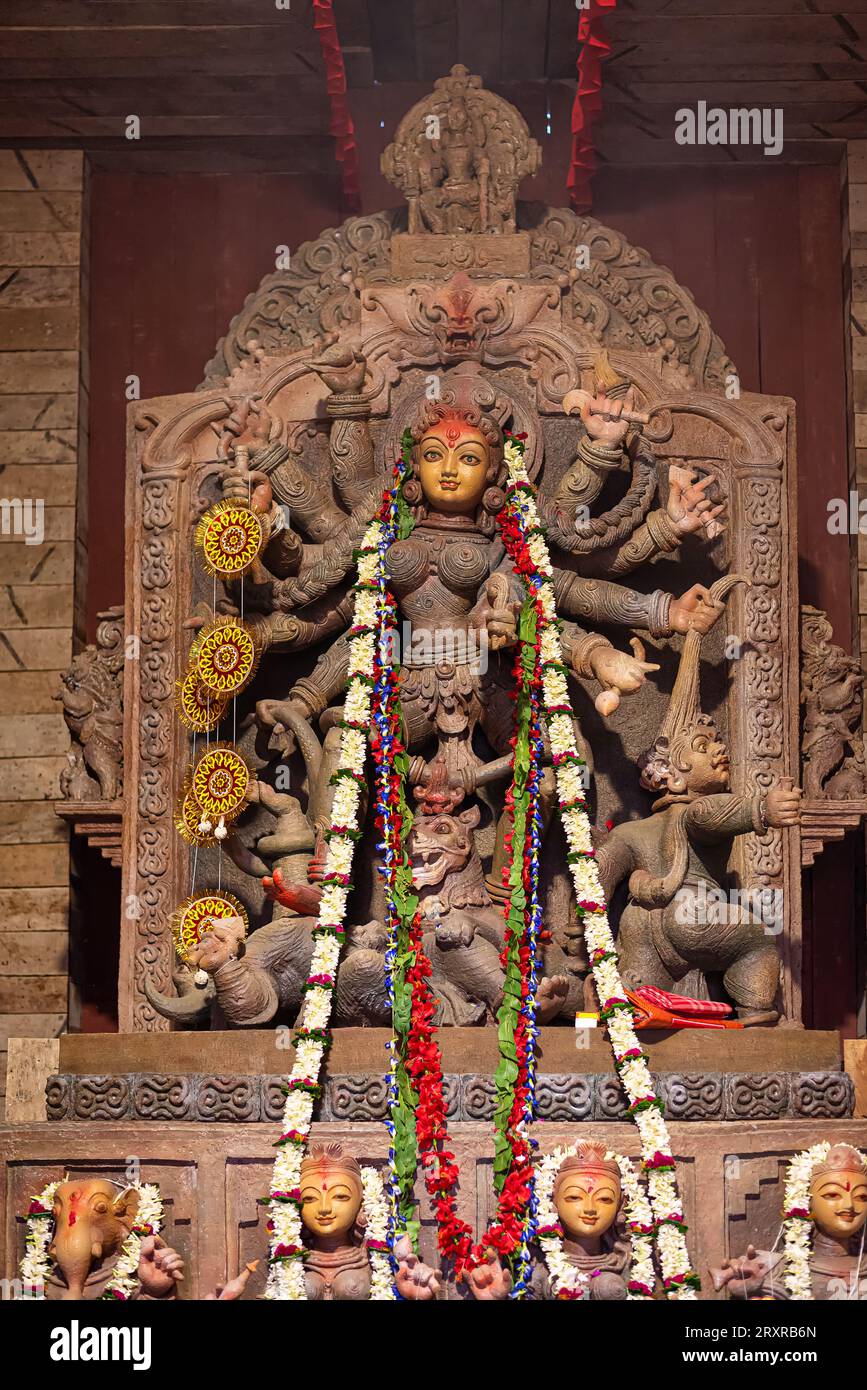 Idol of Goddess Devi Durga at a decorated puja pandal in Kolkata, West Bengal, India Stock Photo ...