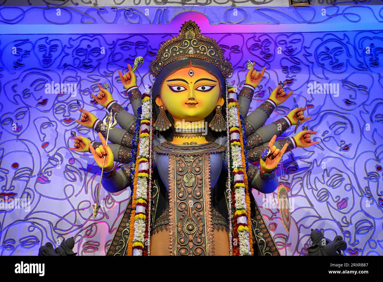 Idol of Goddess Devi Durga at a decorated puja pandal in Kolkata, West Bengal, India Stock Photo ...