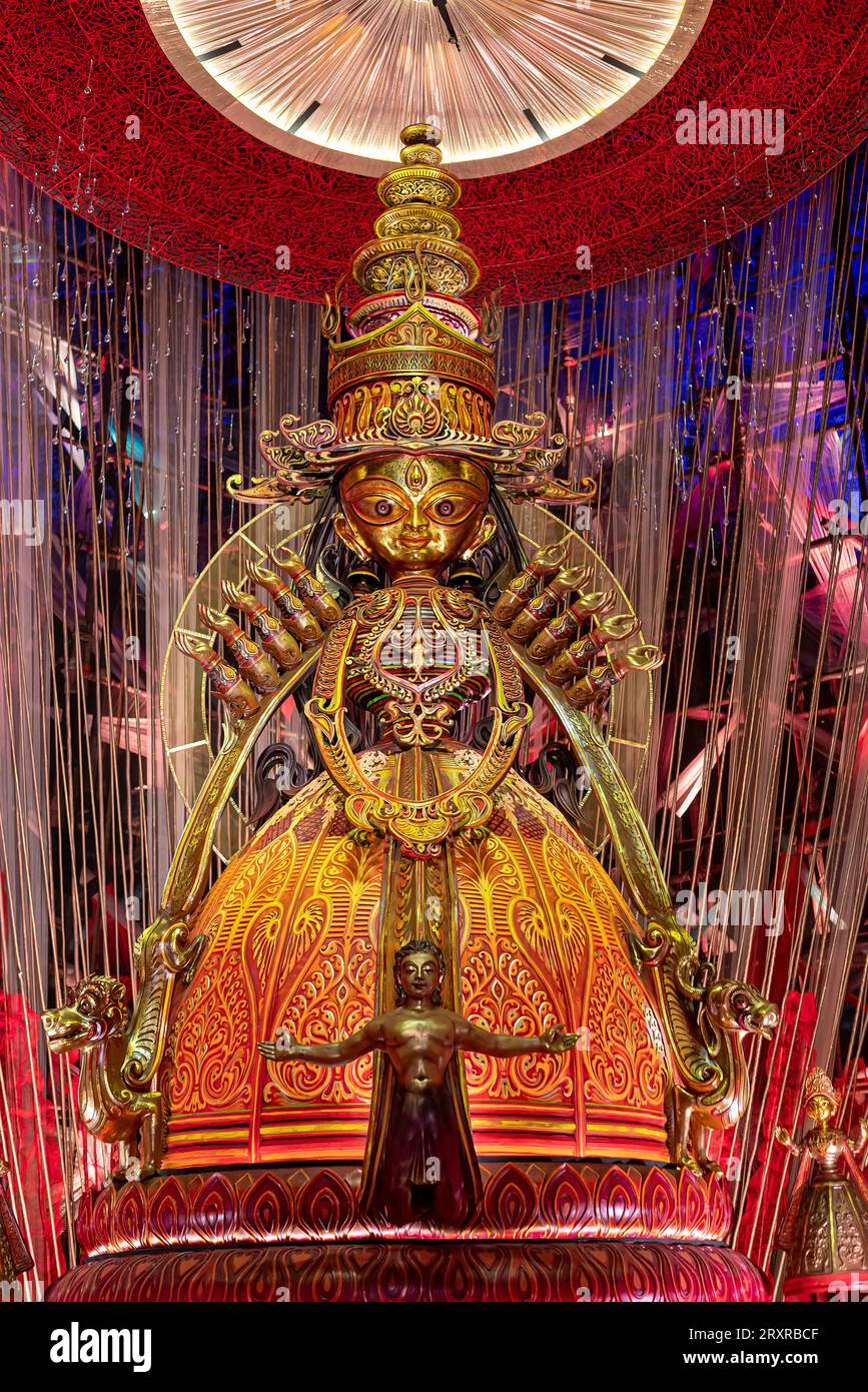 Idol of Goddess Devi Durga at a decorated puja pandal in Kolkata, West Bengal, India Stock Photo ...