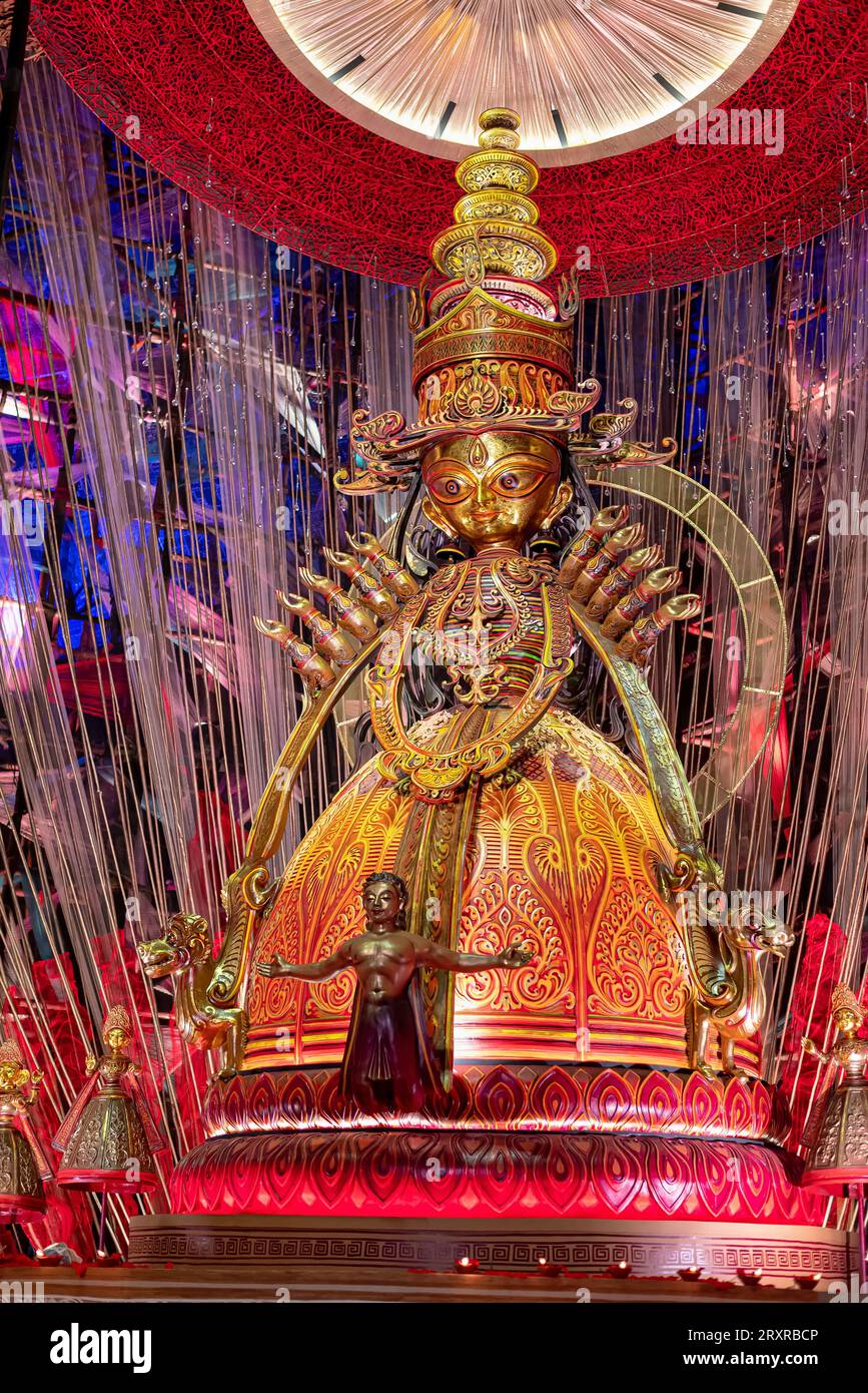 Idol of Goddess Devi Durga at a decorated puja pandal in Kolkata, West Bengal, India Stock Photo ...