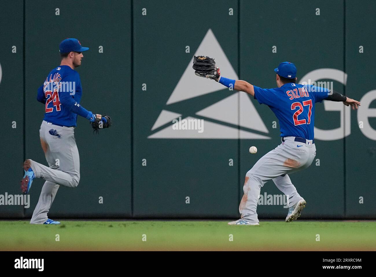 Chicago Cubs right fielder Seiya Suzuki (27) and center fielder Cody ...