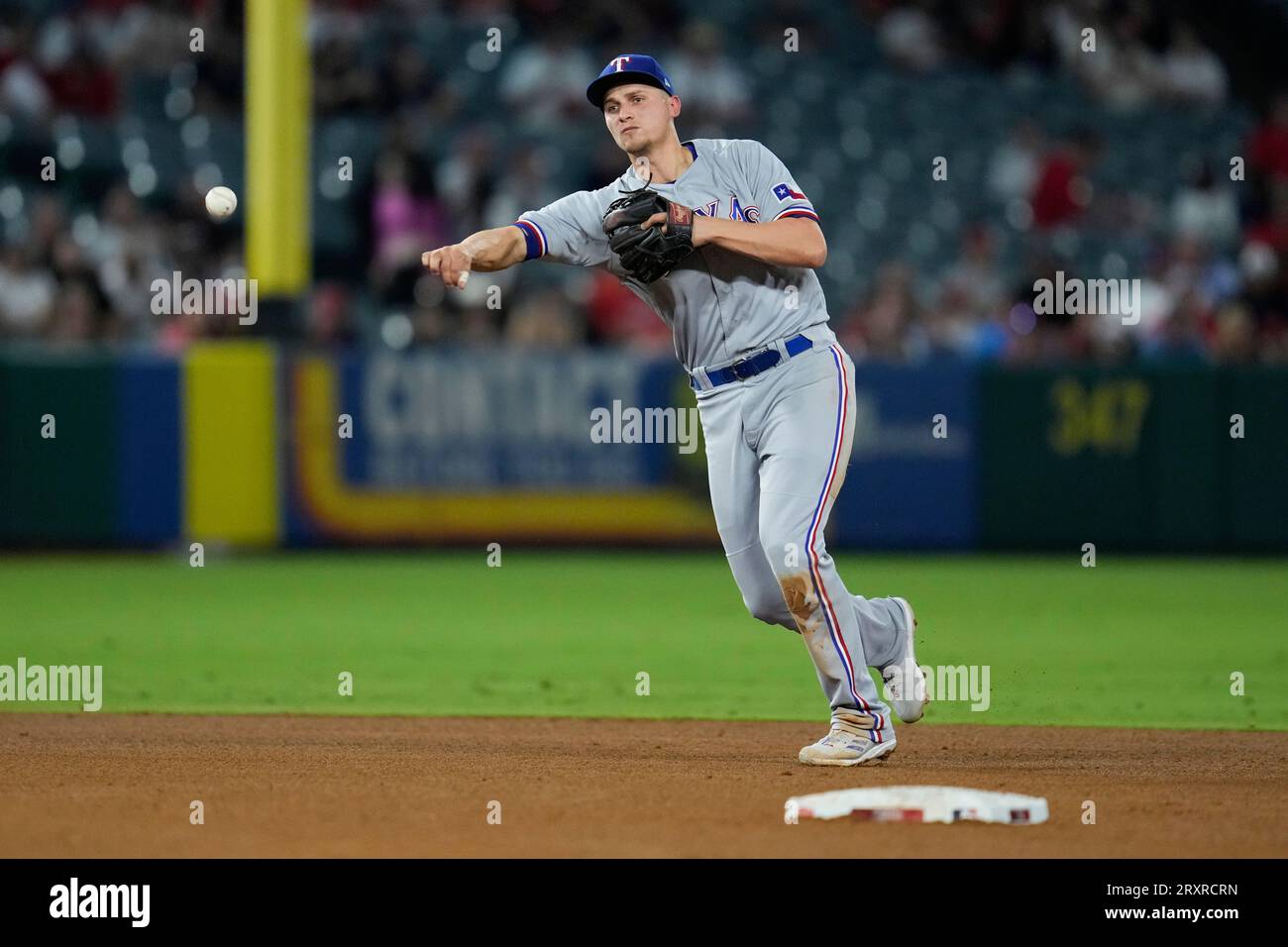 Texas Rangers shortstop Corey Seager (5) throws to first to out Los ...