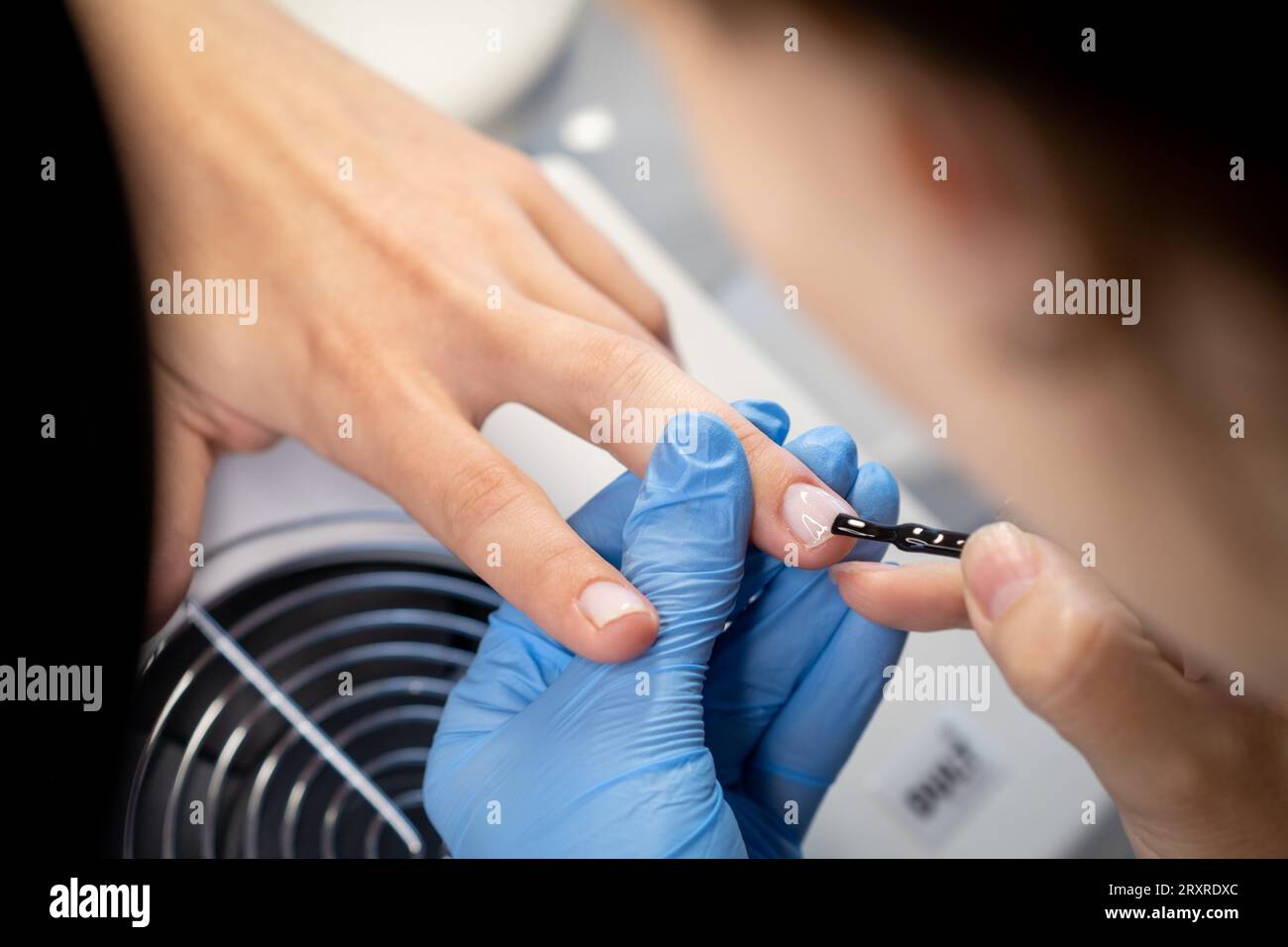 Female hands and tools for manicure, process of performing manicure ...