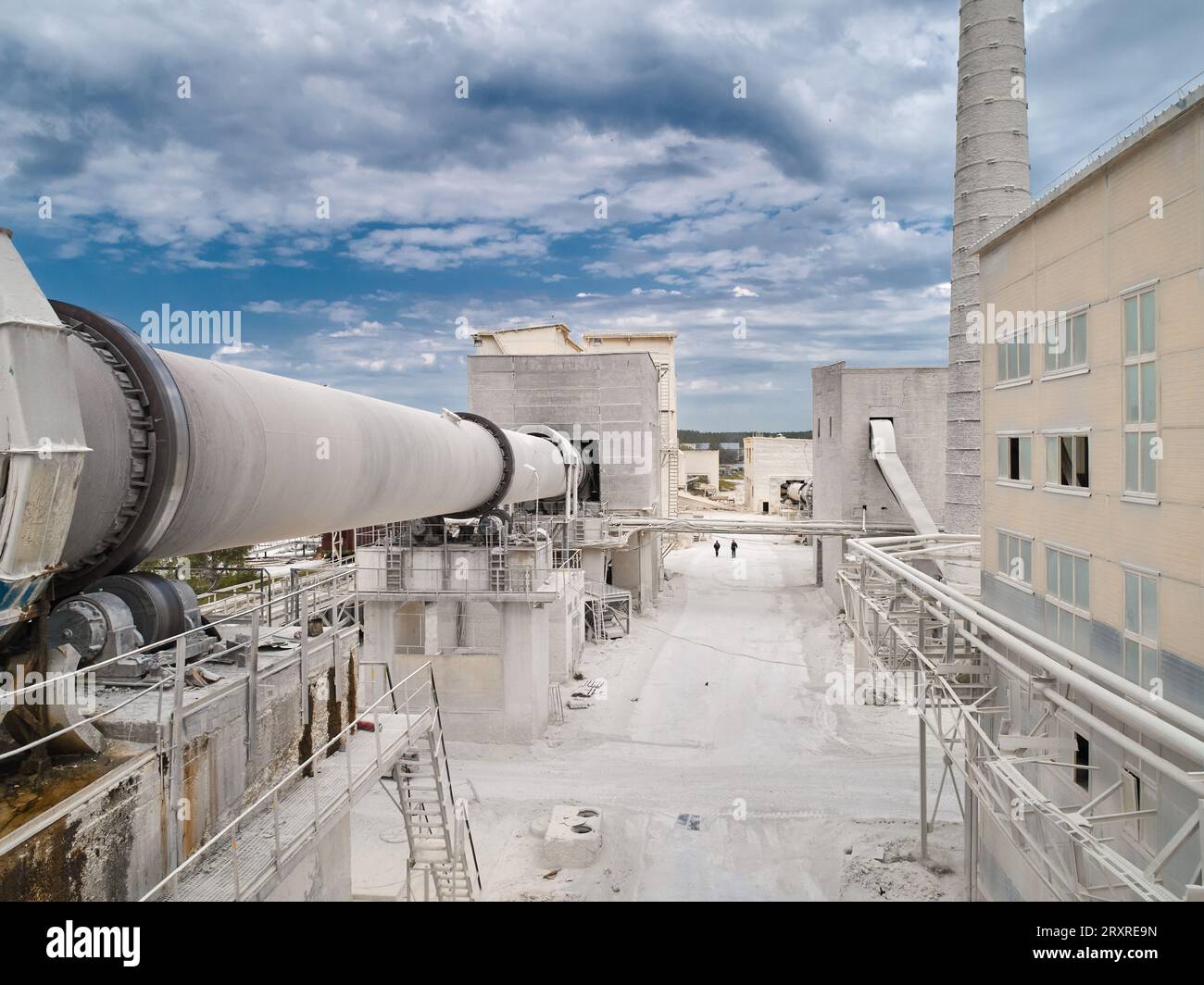 Limestone burning rotating furnace with large pipe at plant Stock Photo ...