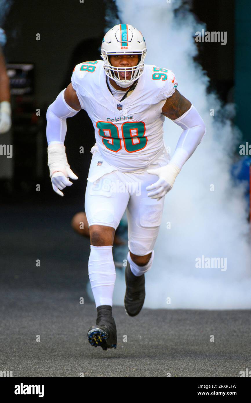 Miami Dolphins defensive tackle Raekwon Davis (98) runs onto the field ...
