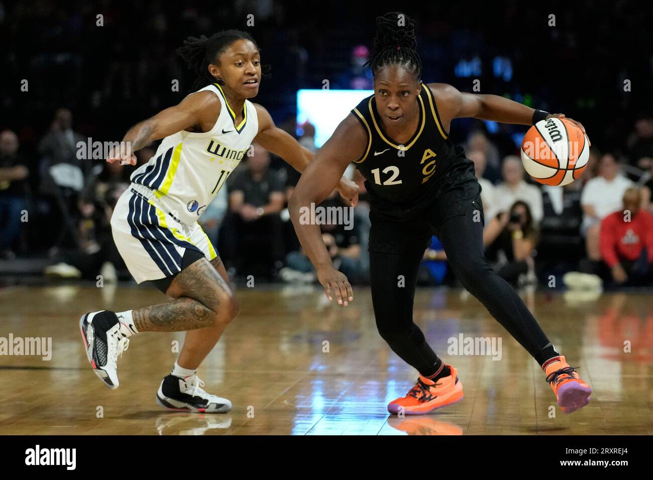 Las Vegas Aces guard Chelsea Gray (12) drives against Dallas Wings ...
