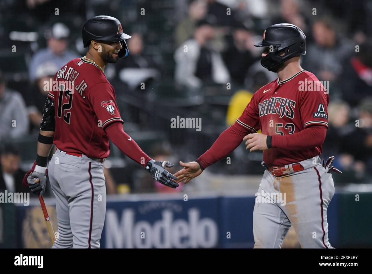 Arizona Diamondbacks' Christian Walker, right, celebrates with Lourdes ...