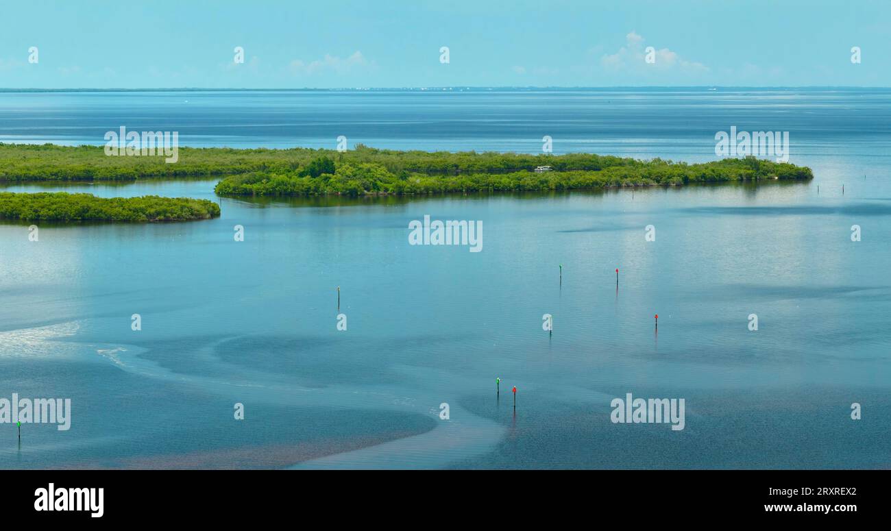 Aerial view of Florida wetlands with green vegetation between ocean ...