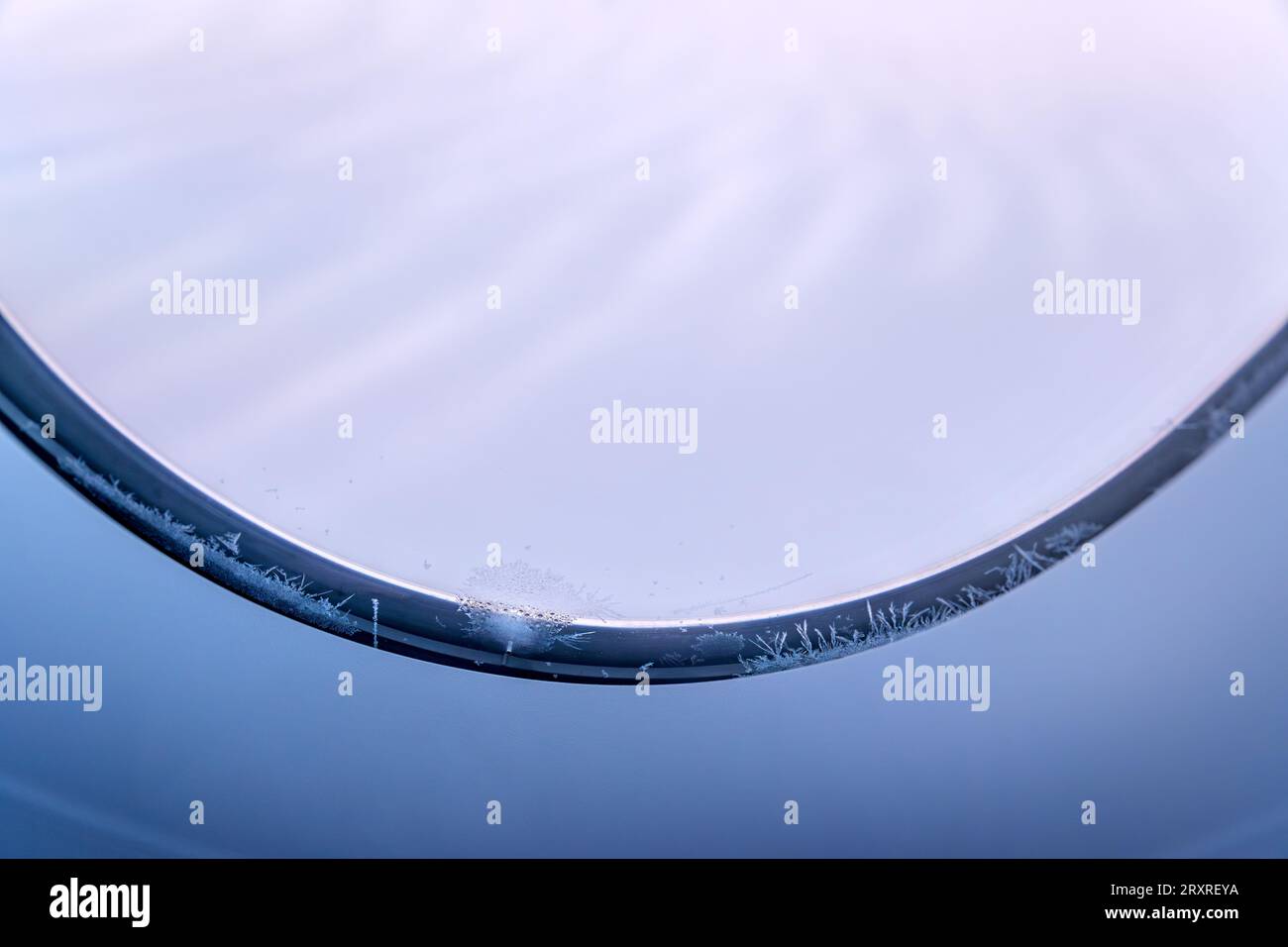 Frost forming on an airplane window, while flying North Pole polar ...
