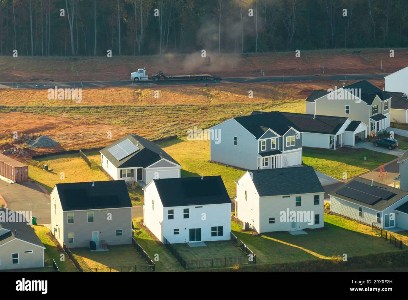 Aerial view of real estate development with tightly located family ...