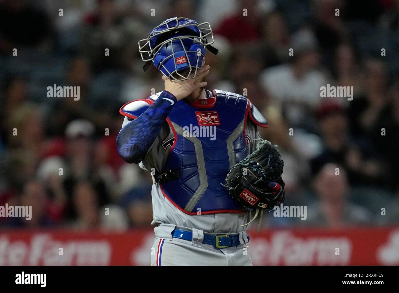 Texas Rangers catcher Jonah Heim reacts after Los Angeles Angels' Logan ...