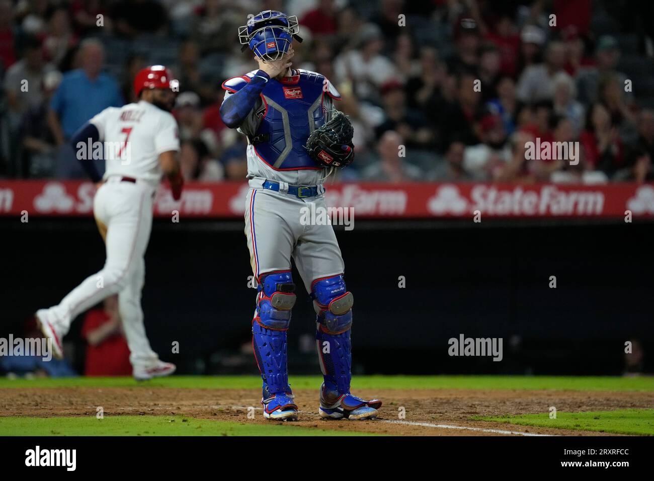 Texas Rangers catcher Jonah Heim reacts after Los Angeles Angels' Logan ...