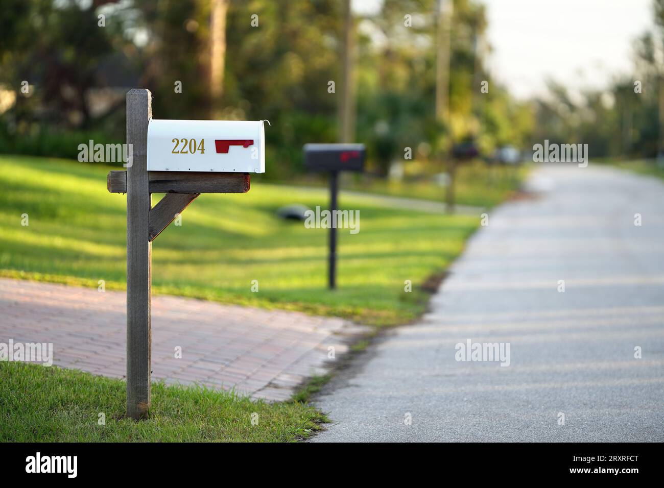 American mailbox at Florida home front yard on suburban street side ...
