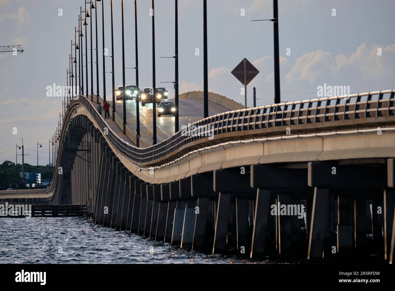 Barron Collier Bridge and Gilchrist Bridge in Florida with moving ...
