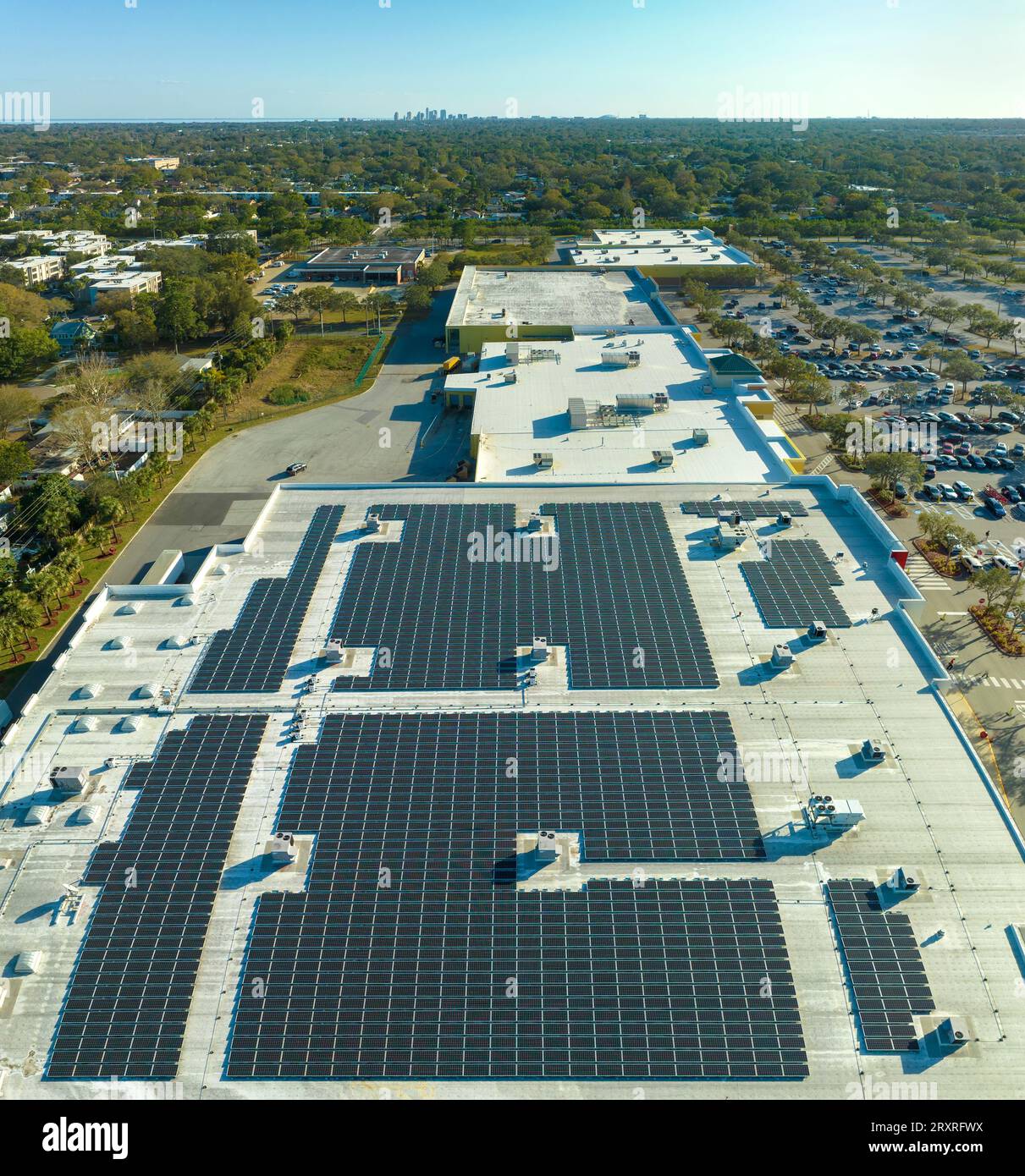 Electric photovoltaic solar panels installed on shopping mall building ...