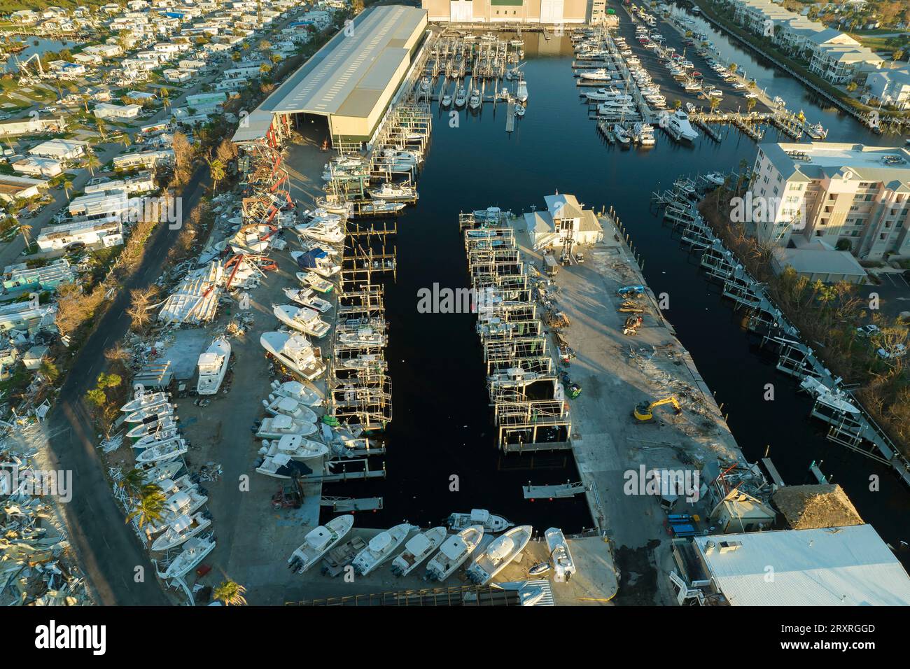 Warehouse with motorboats and yachts destroyed by hurricane winds in ...