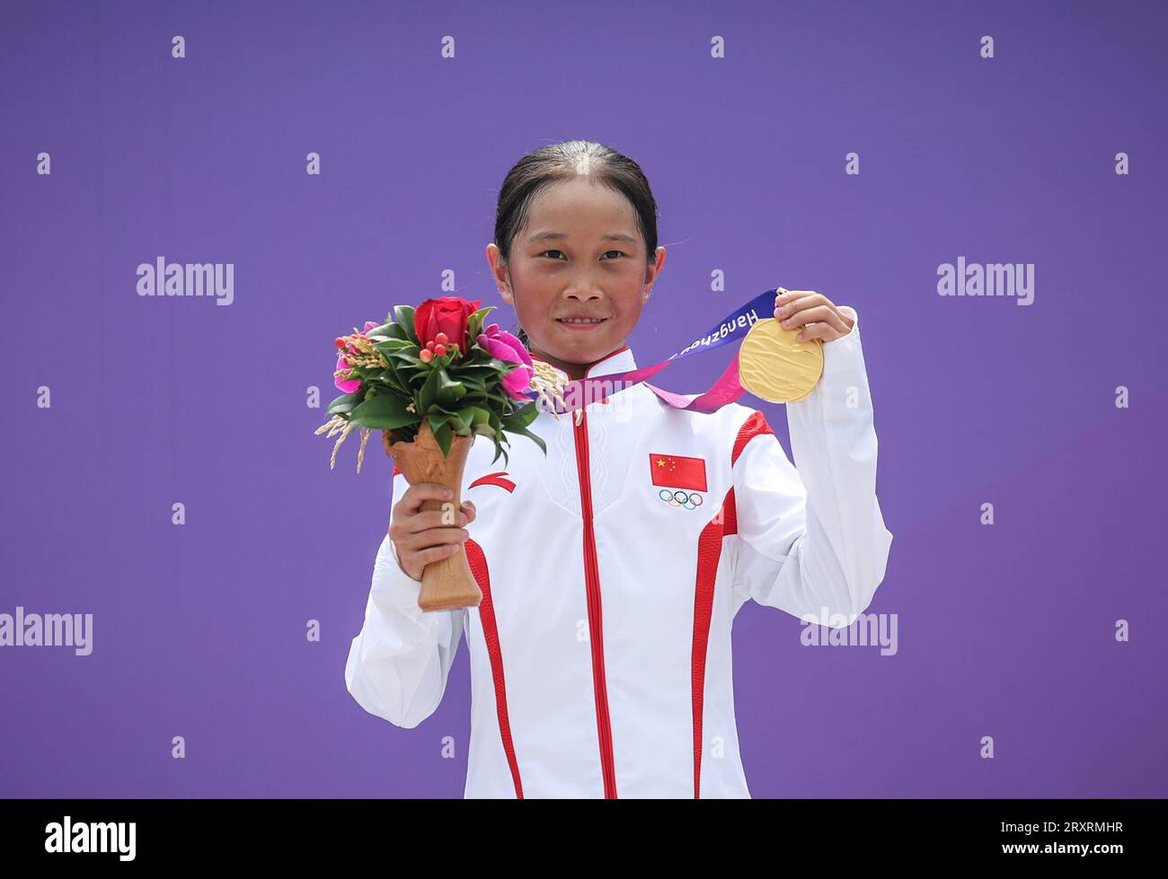 Hangzhou, China's Zhejiang Province. 27th Sep, 2023. Gold medalist Cui Chenxi of China poses ...