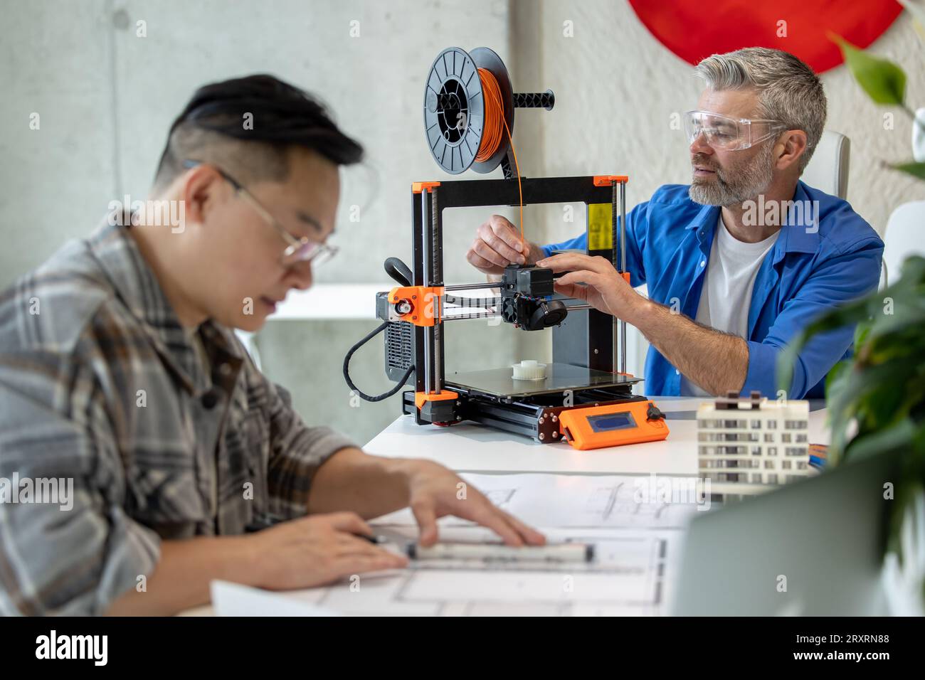Architects making house model using 3D printer, FDM technology for ...
