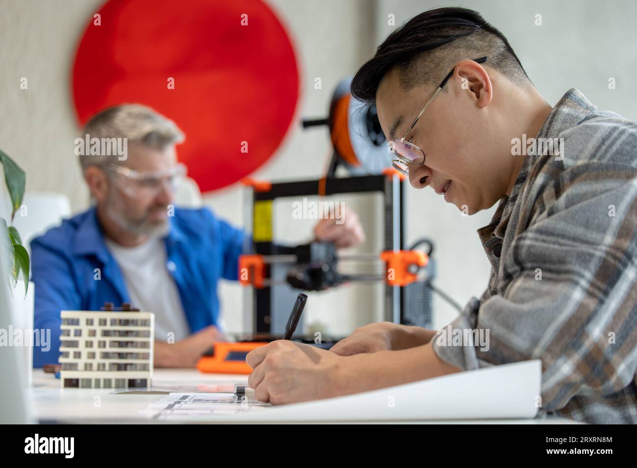 Architects making house model using 3D printer, FDM technology for ...