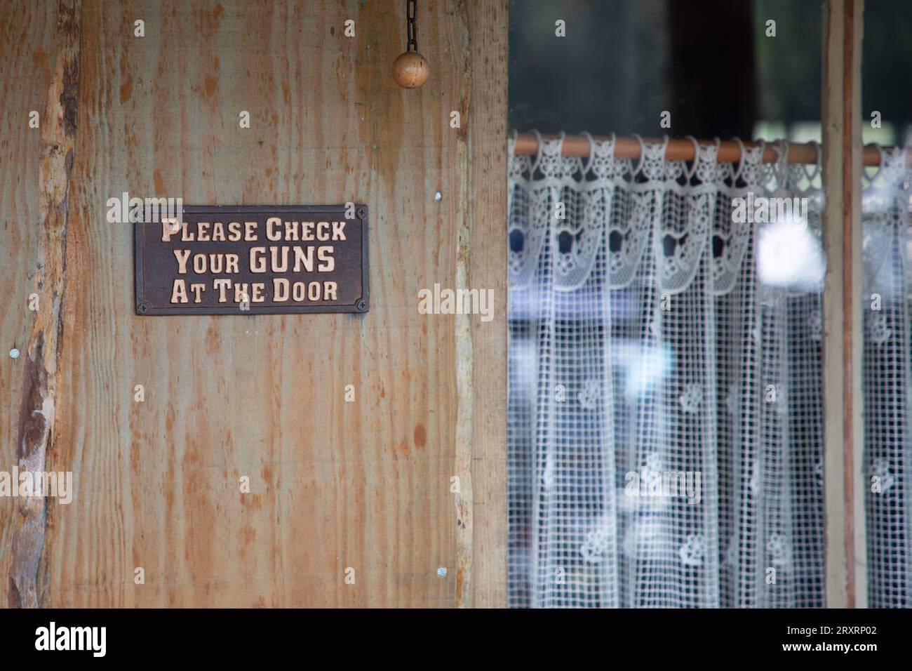 Please Check Your Guns at the Door panel text metal sign in wooden bar ...