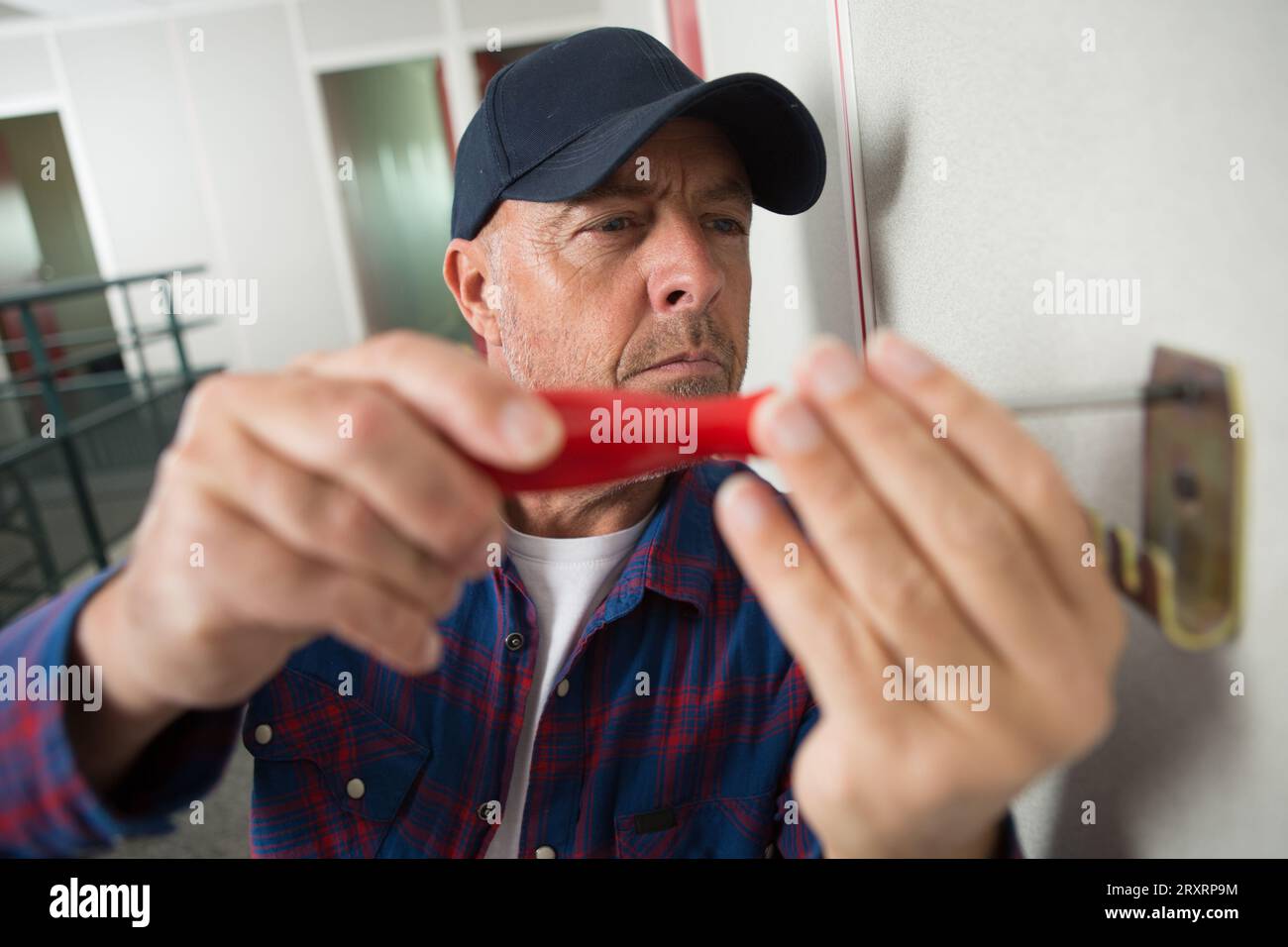 Hook in the wall hi-res stock photography and images - Alamy