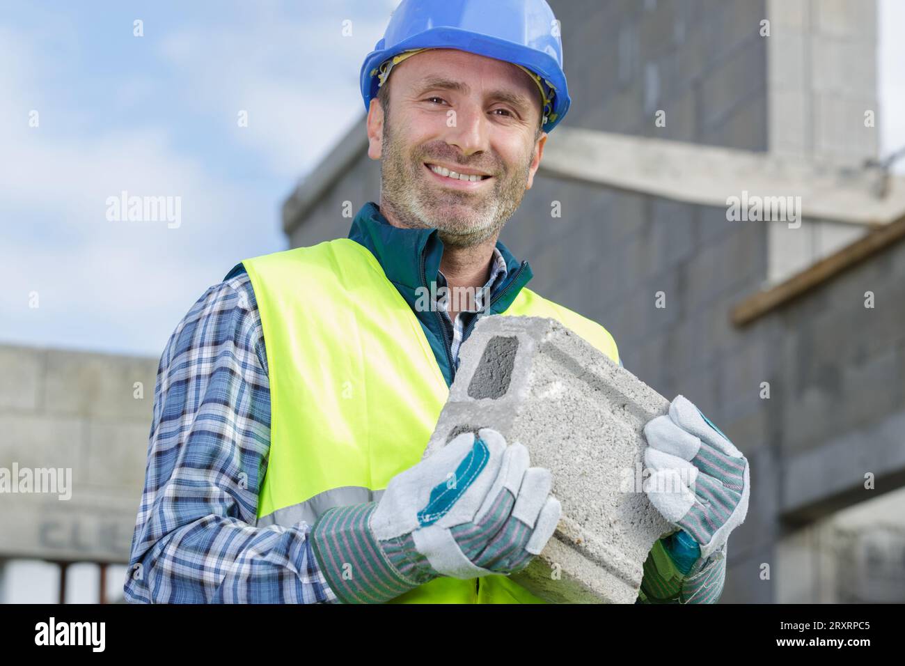 a worker with cement concrete Stock Photo - Alamy