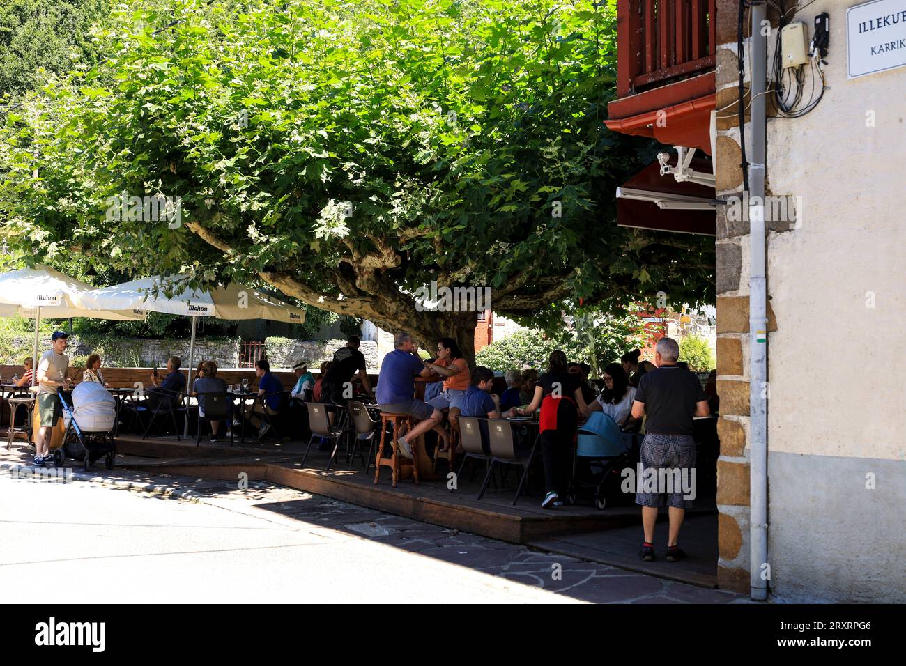 Bera, Navarre,Spain- August 14, 2023: Bar terrace with beautiful trees ...