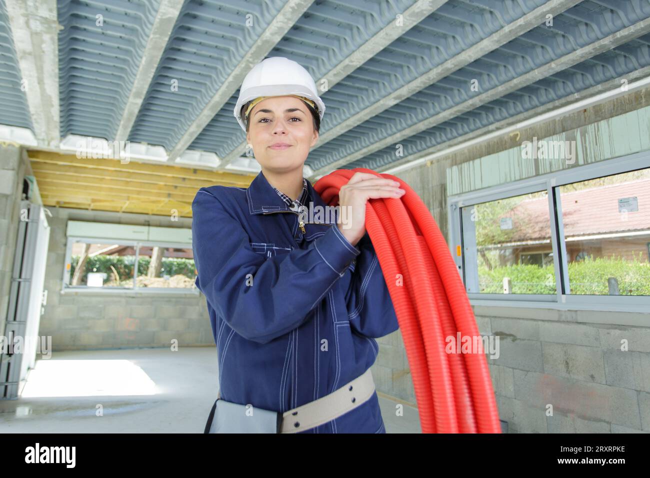female construction worker with positive attitude Stock Photo - Alamy